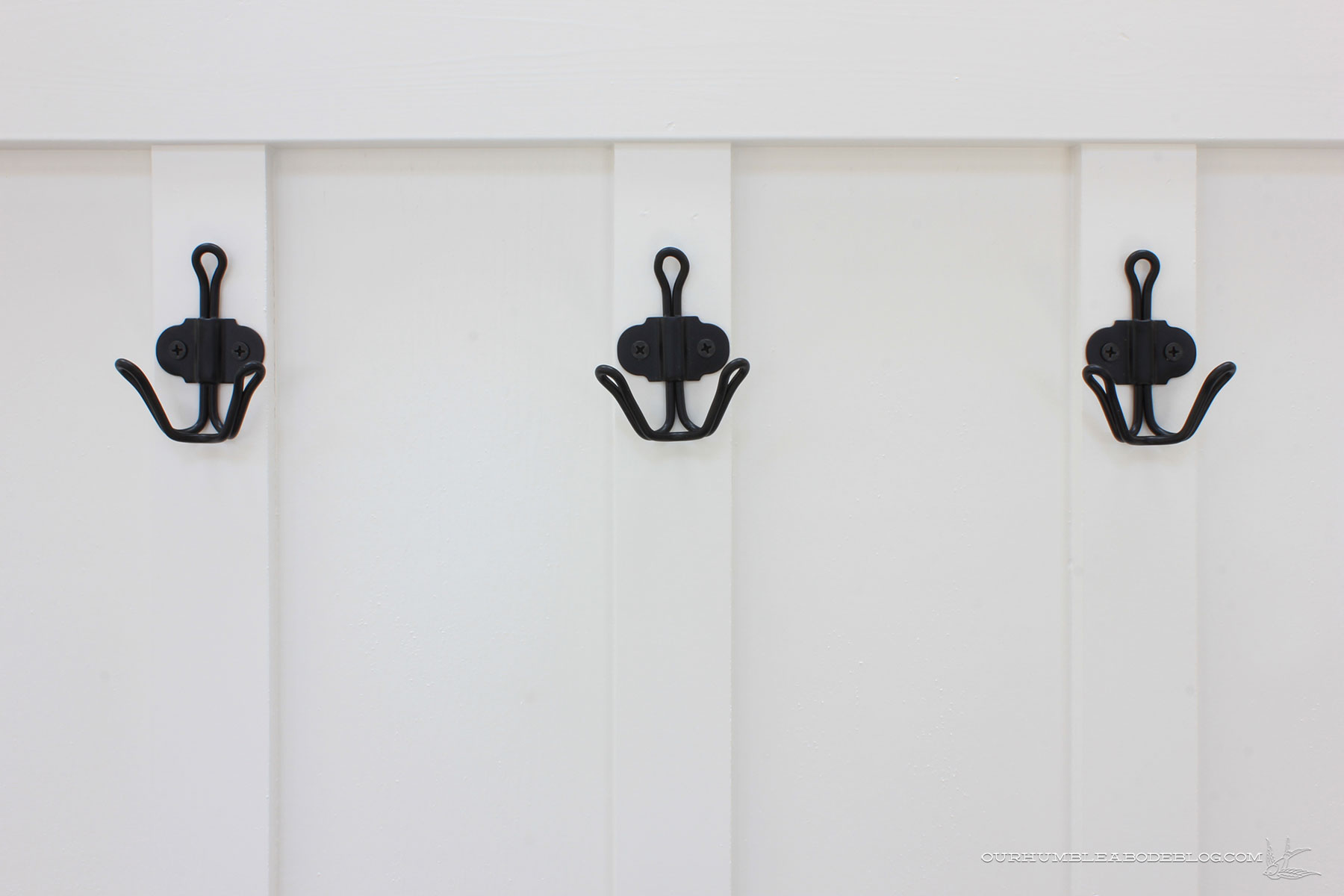 How To Hang a Straight Row of Hooks (or Anything)